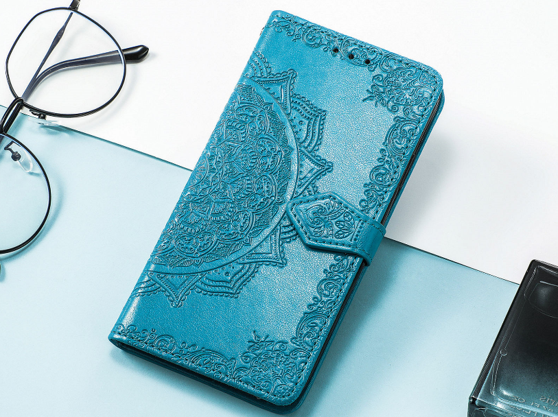 Чехол-книжка из кожи с тиснением для Google Pixel 6 Pro бирюзовый с загадочными узорами