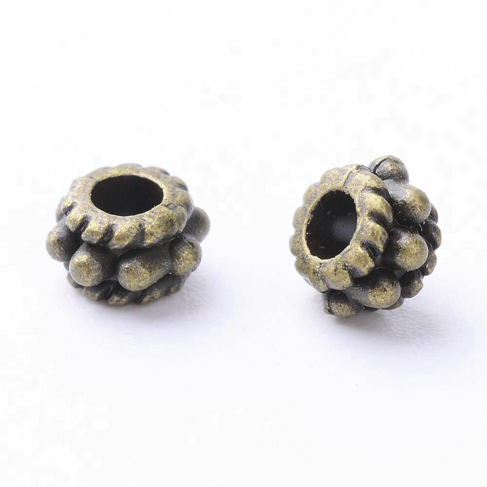 Бусина металлическая, 5х3мм, рондель, узорная, базовый материал - цинковый сплав, бронзовая с чернением, 10 грамм