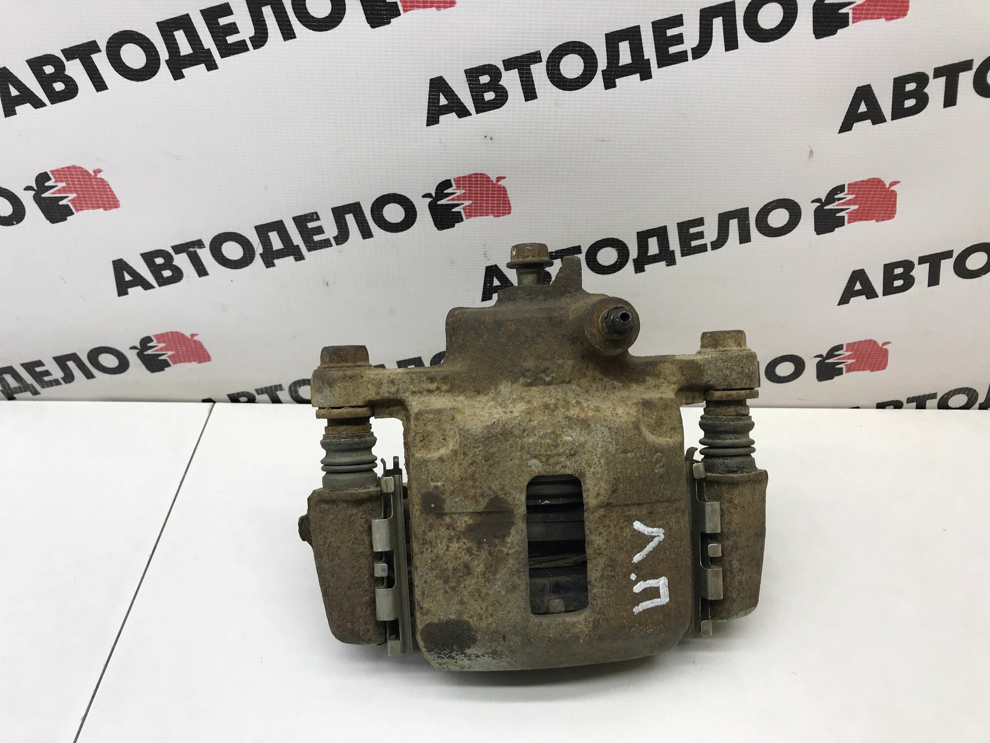 Суппорт тормозной п/л Nissan Sunny B12 1987 г.в