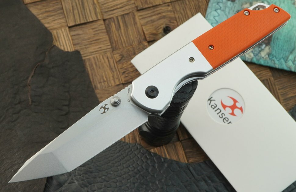 Складной нож Kansept Knives Warrior, сталь D2, SW, рукоять алюминий/оранжевый G-10