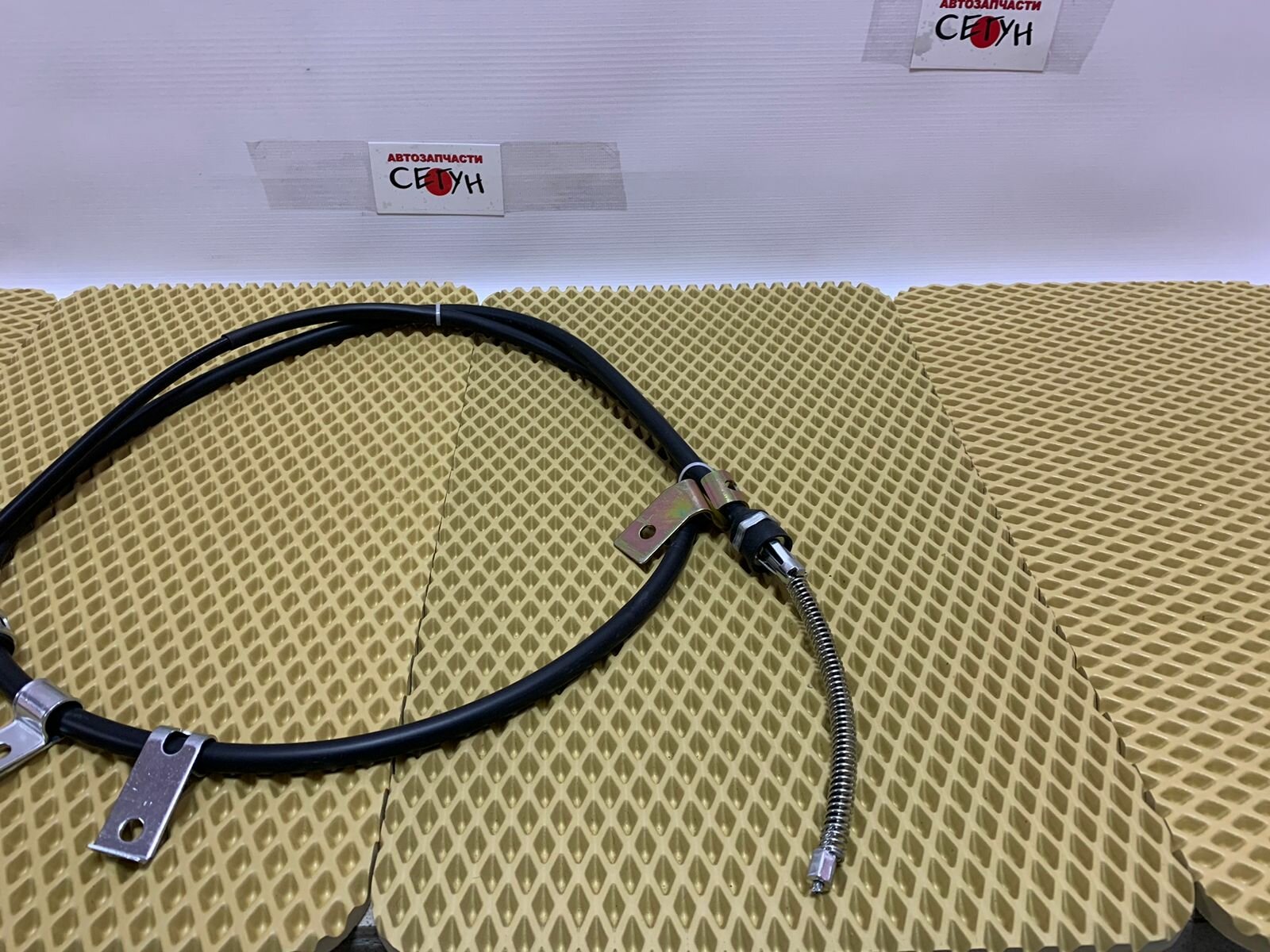 Трос стояночного тормоза General Parts, для Mitsubishi L200/L2000/Triton, левый