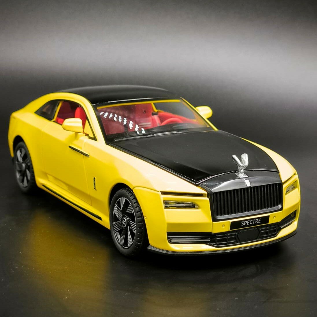 Машина металлическая Rolls-Royce Spectre с световым и звуковым сопровождением. Масштаб 1:24