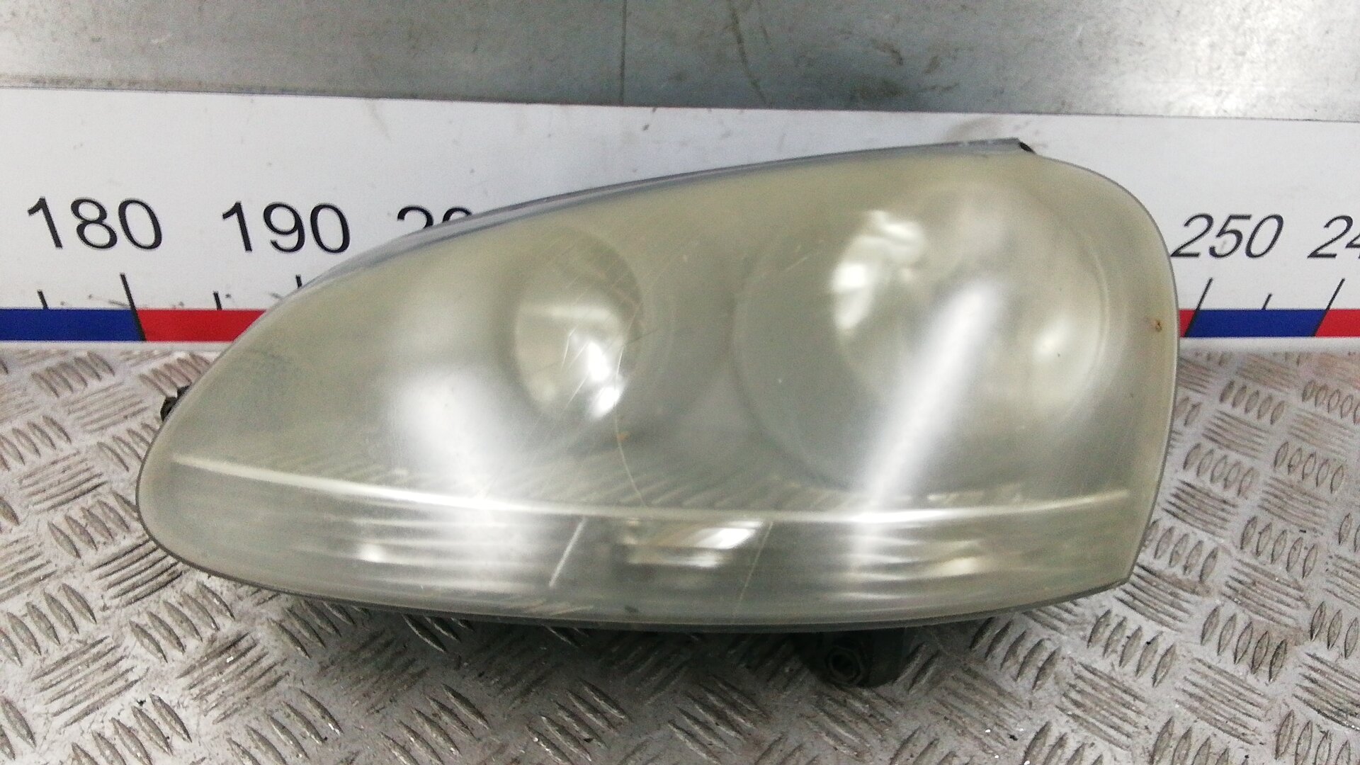 Фара левая VOLKSWAGEN GOLF 5, Номер 1K6941005E, 1LG24700703