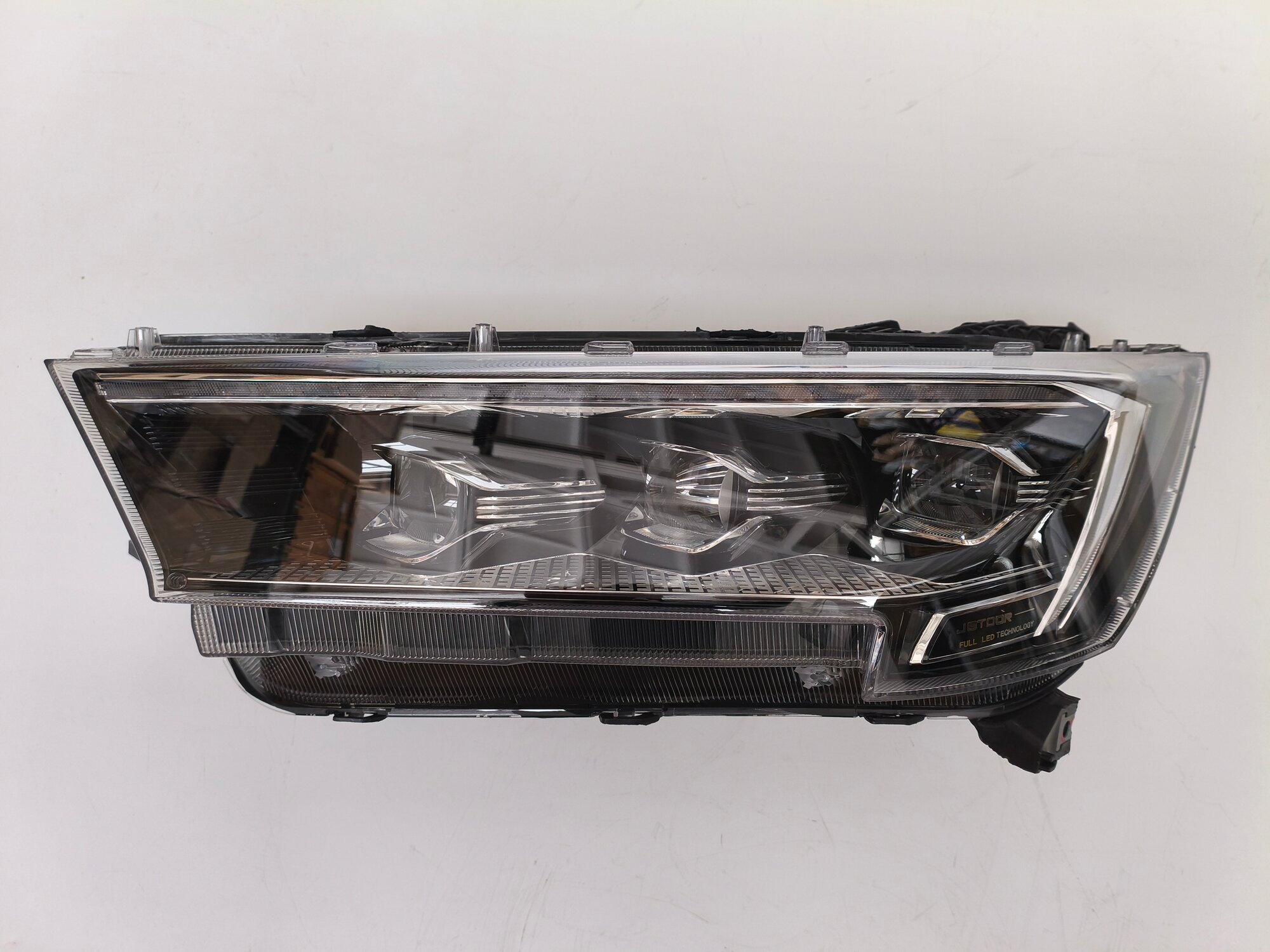 Фара левая Jetour X90 Plus [1.6 16V 7AMT внедорожник Turbo] F084421010FL