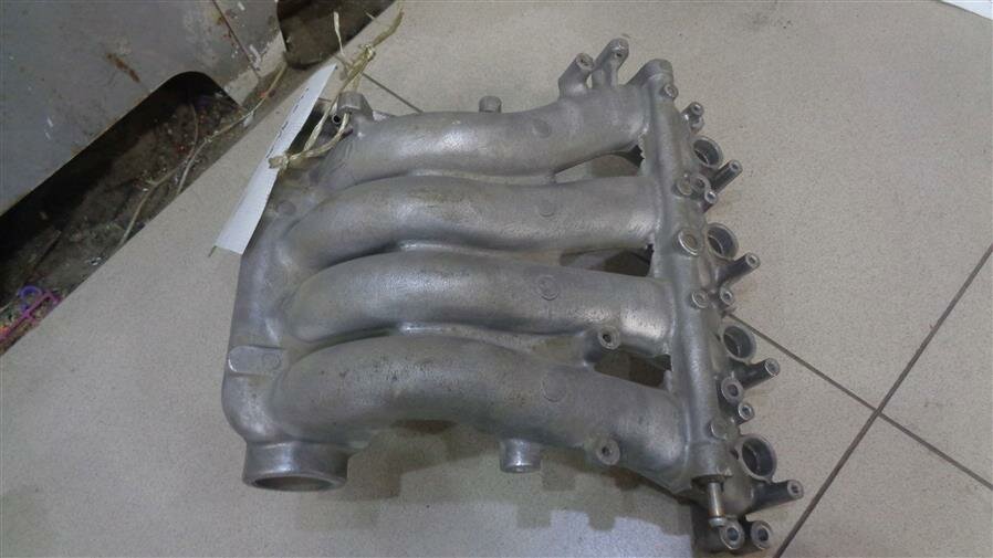 Коллектор впускной от Mitsubishi Lancer Cedia CS 2000-2003