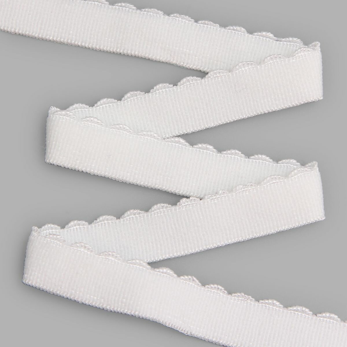 МЛ175.012/1 Резинка отделочная (становая) 5,03гр/м, эластичность 120%, 12мм*50м (молочный)