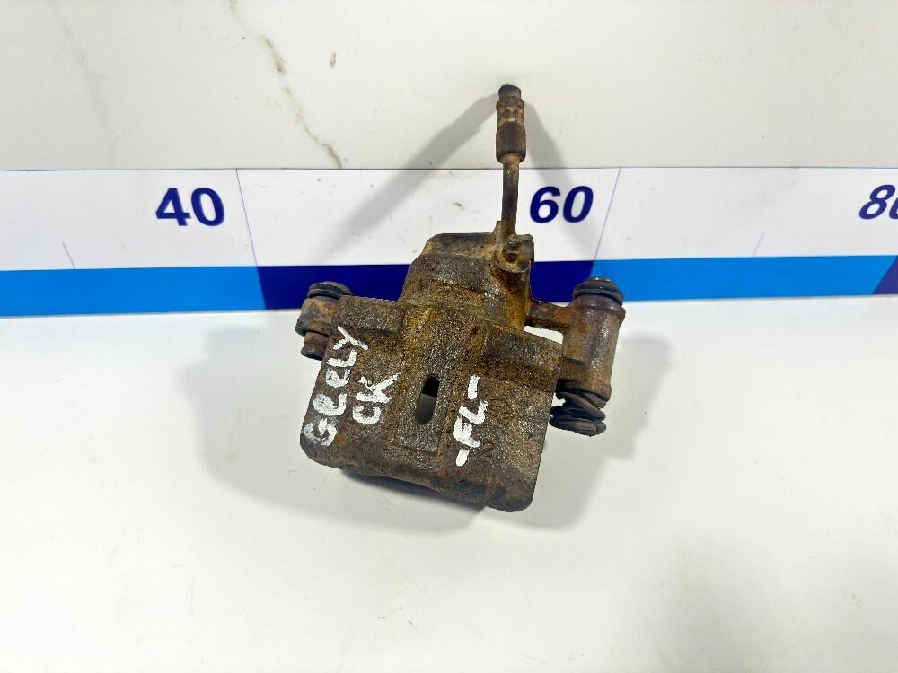 Суппорт передний левый Geely CK 1402136180