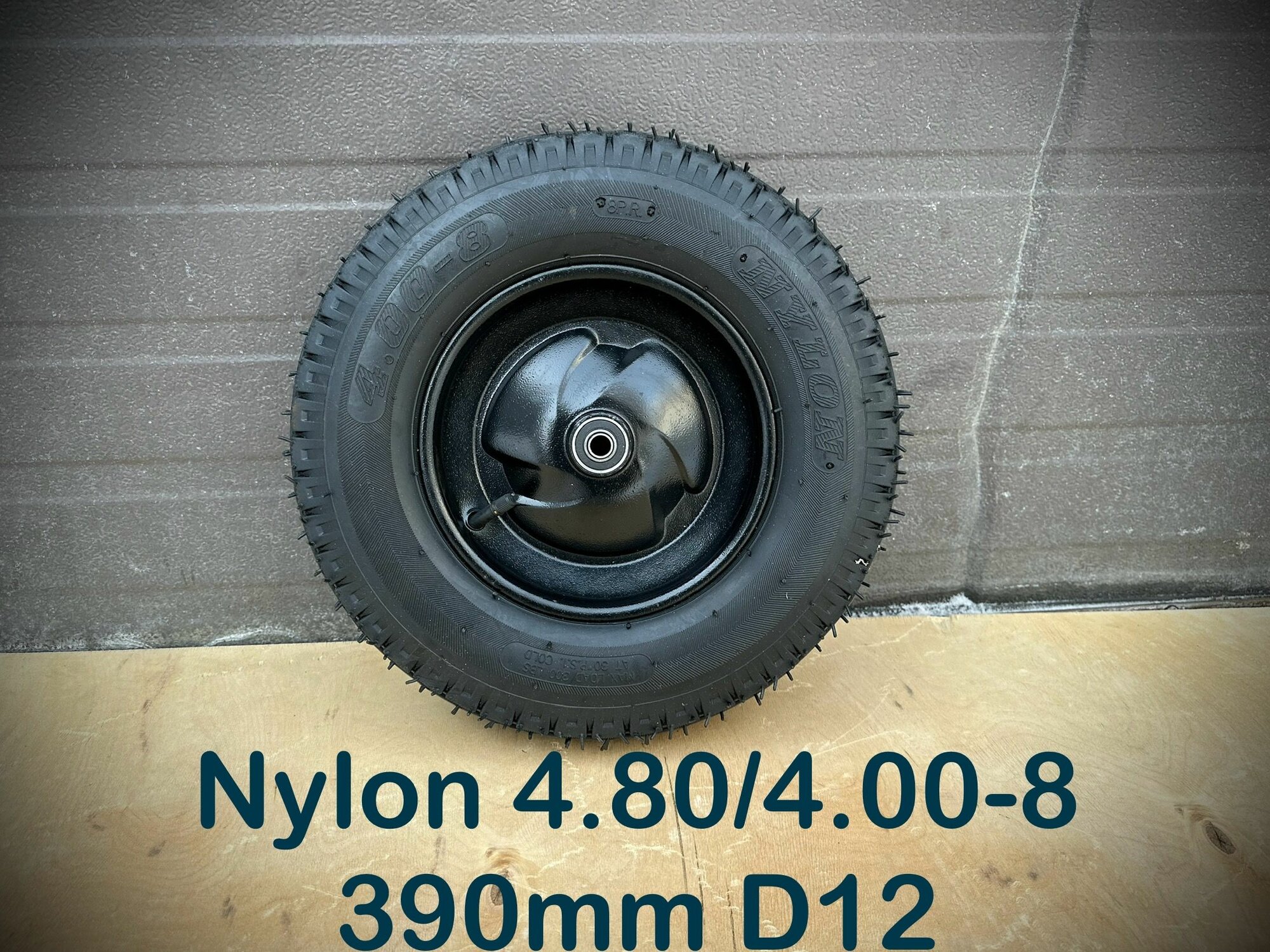 Колесо для строительной тачки усиленное с камерой NORD NYLON 4.80-8/4.00-8, подшипник с осью d12мм, ширина ступицы 100мм, диаметр колеса 390мм