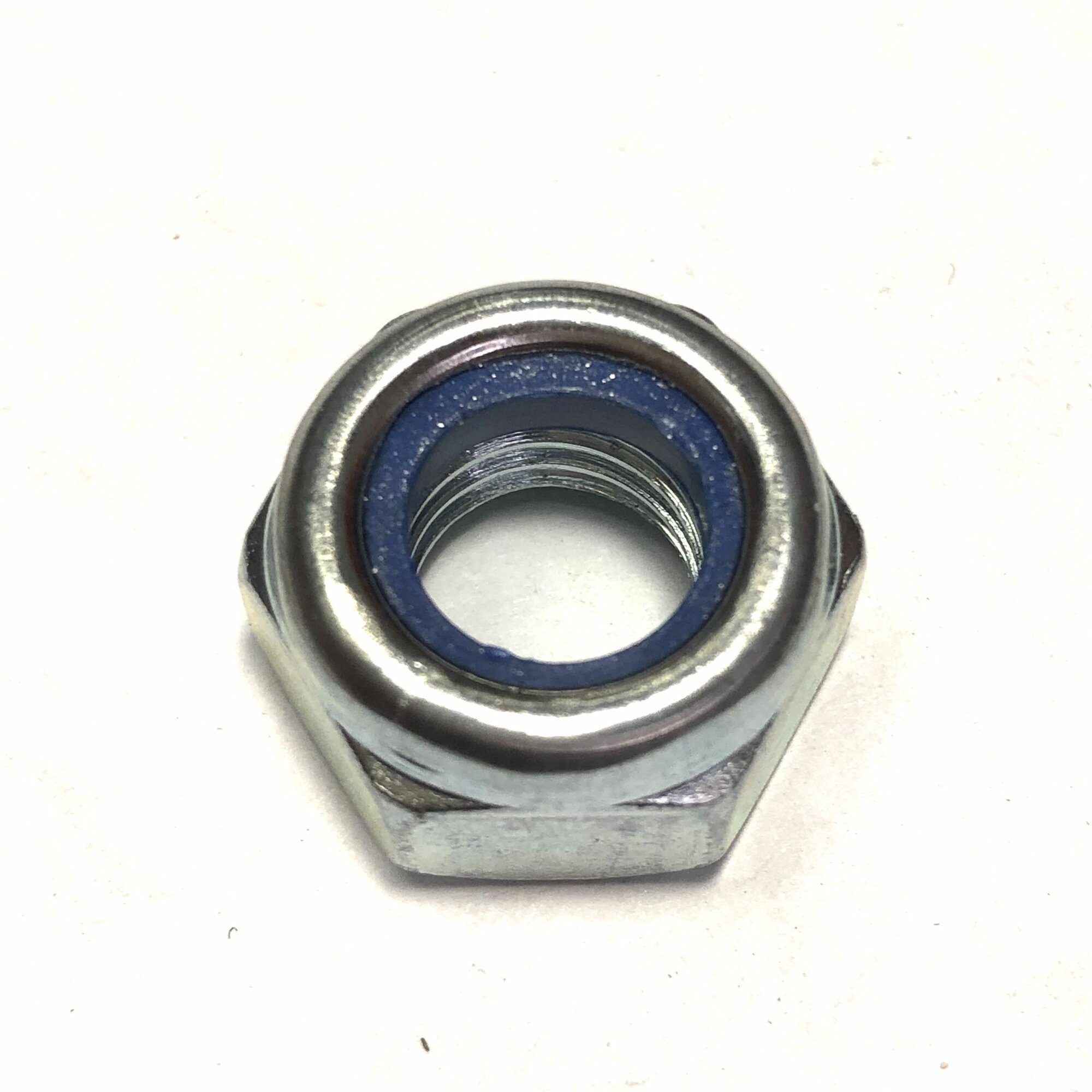 Гайка Буран М10 на болт крепления двигателя верхняя самоконтр. 110300138