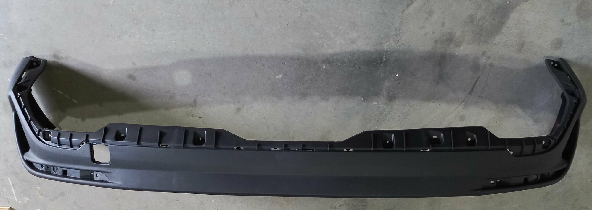 Бампер задний нижняя часть Geely Coolray [1.5 12V 7AMT внедорожник] 6600124874