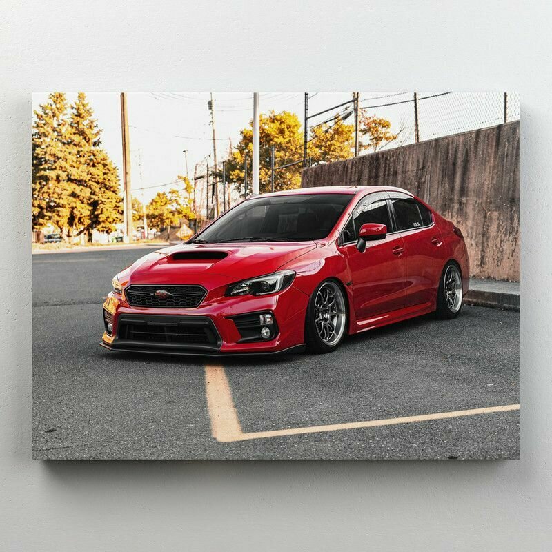 Интерьерная картина на холсте "Красный Subaru WRX на дороге - Автомобиль у забора" размер 30x22 см