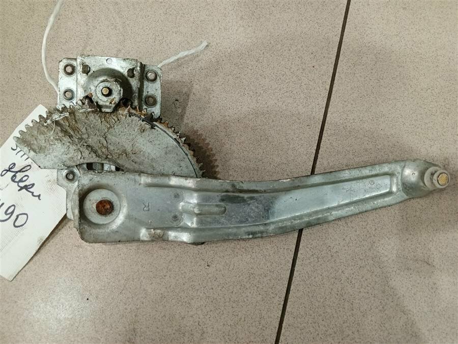 Стеклоподъемник задний правый механический от Mazda Demio DW 1996-2002