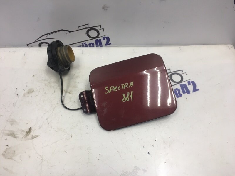 Б/У лючок топливного бака Kia Spectra 2006 SD S6D красный перец 16583 Hyundai-KIA арт. 0K2A142410D