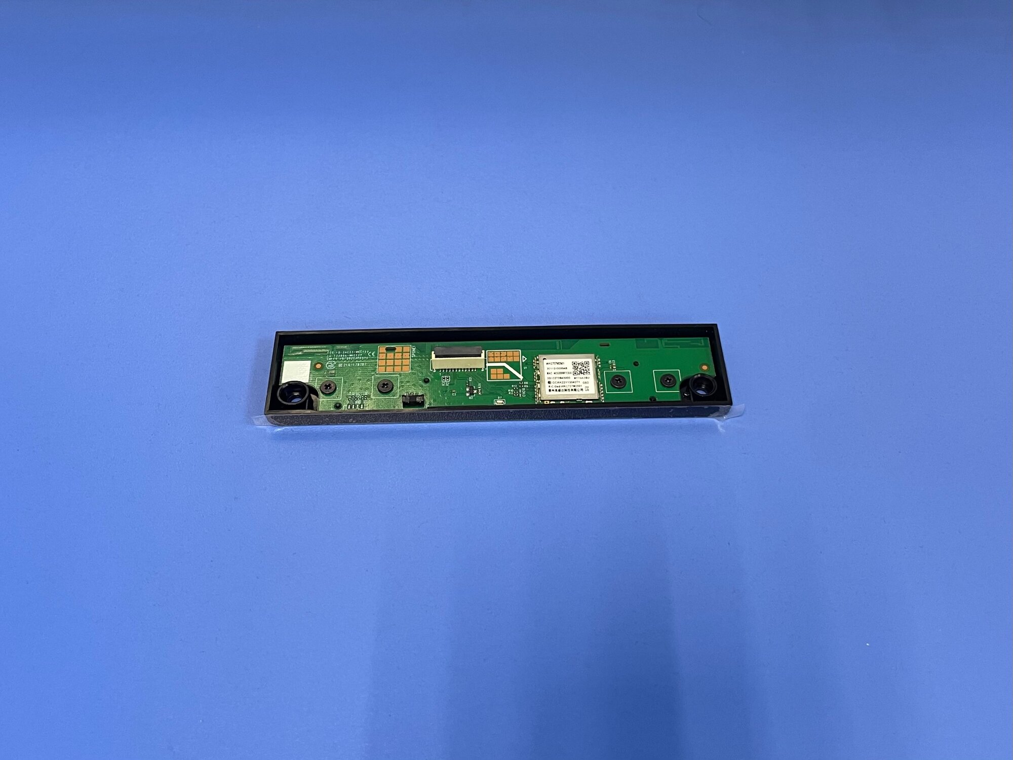 Модуль Wi-Fi с кнопкой "вкл/выкл" (WKCT27M2501) для телевизора TCL 43P637