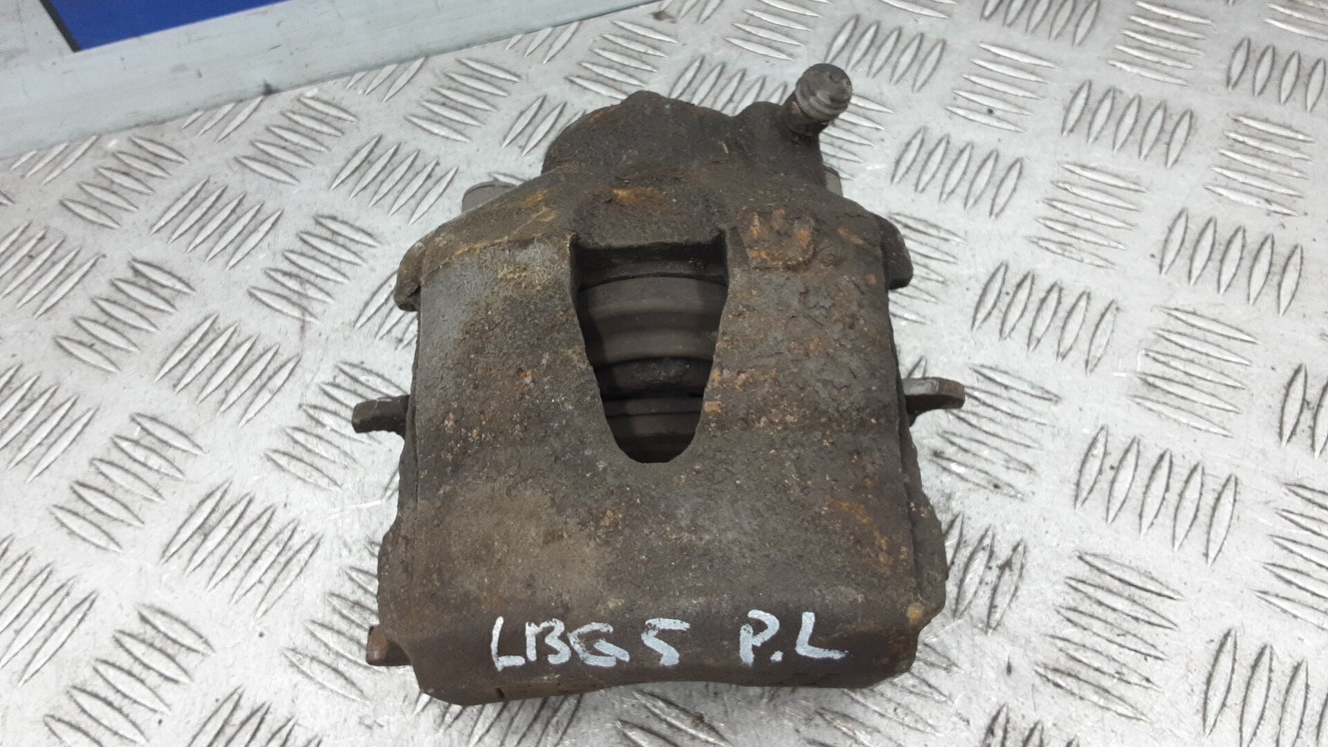 Суппорт тормозной передний левый SKODA FABIA 2