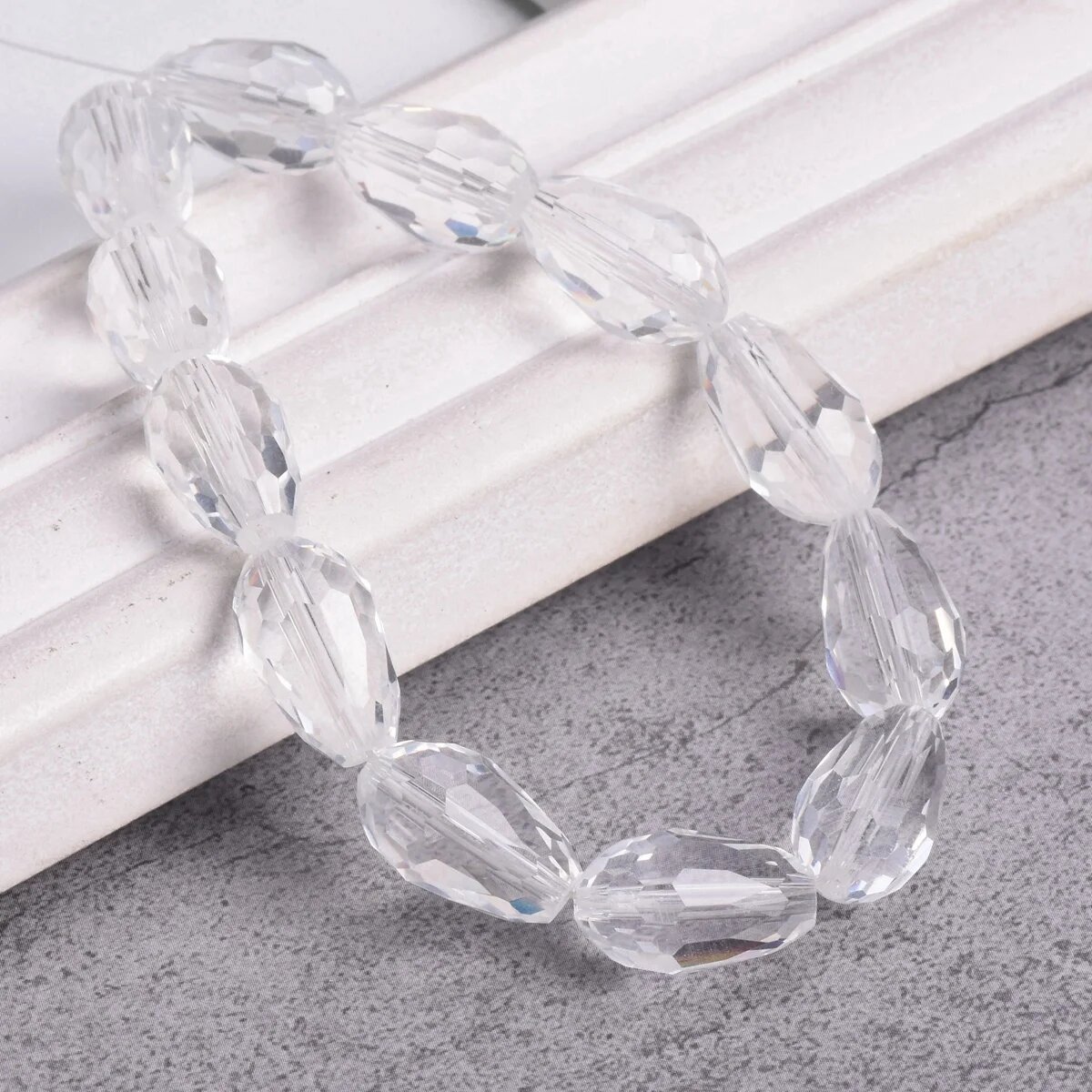 Хрустальные бусины каплевидные, 7x5 мм, Clear, 50шт