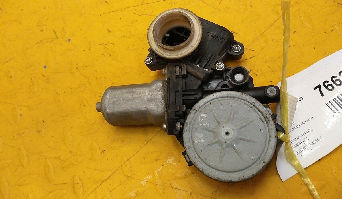 Моторчик стеклоподъемника Camry V40 Toyota 8570233010