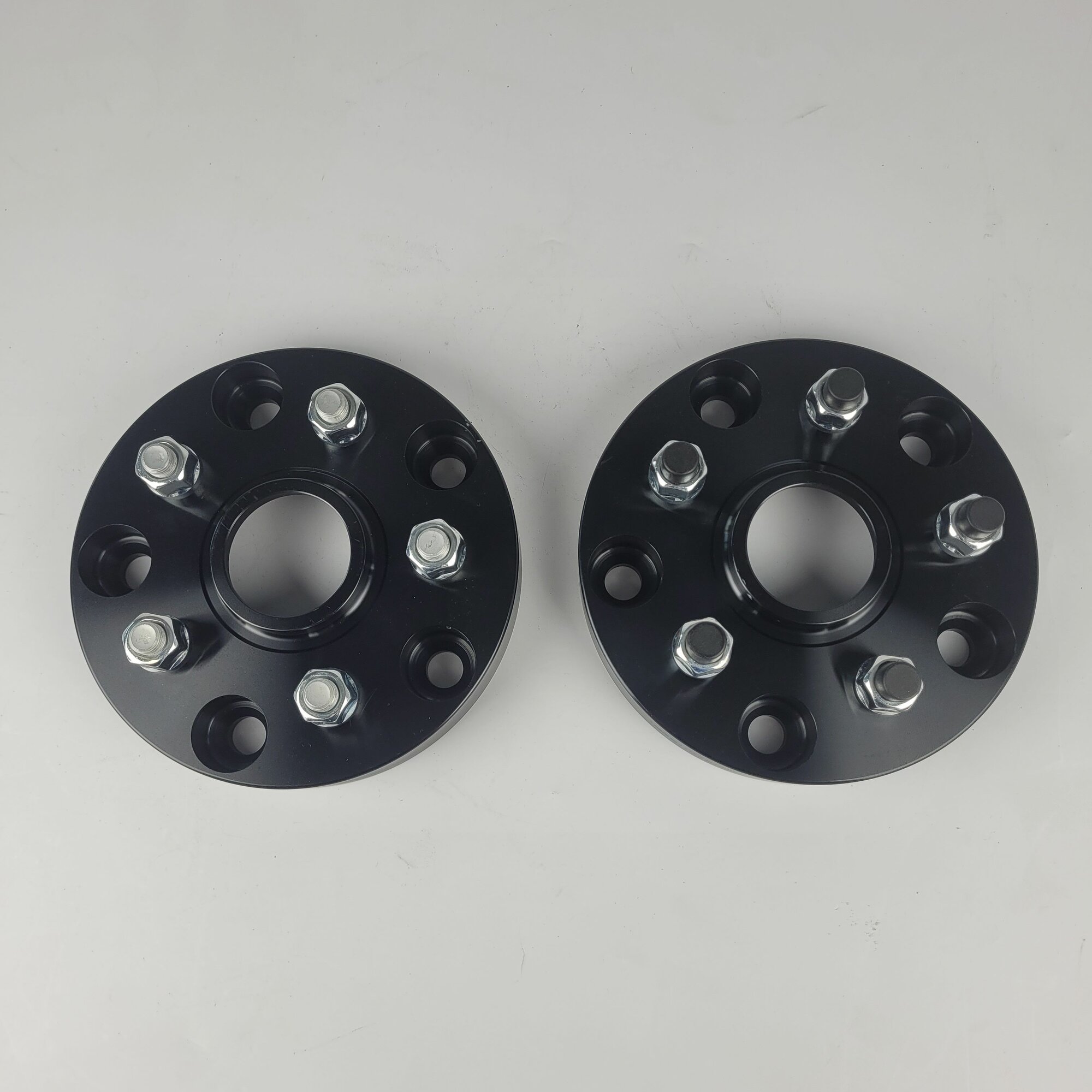 Проставки ступичные кованые переходные Нива - Тойота 5х139,7/5х114,3 ЦО 98,5/60.1 30мм M12*1.5 пара