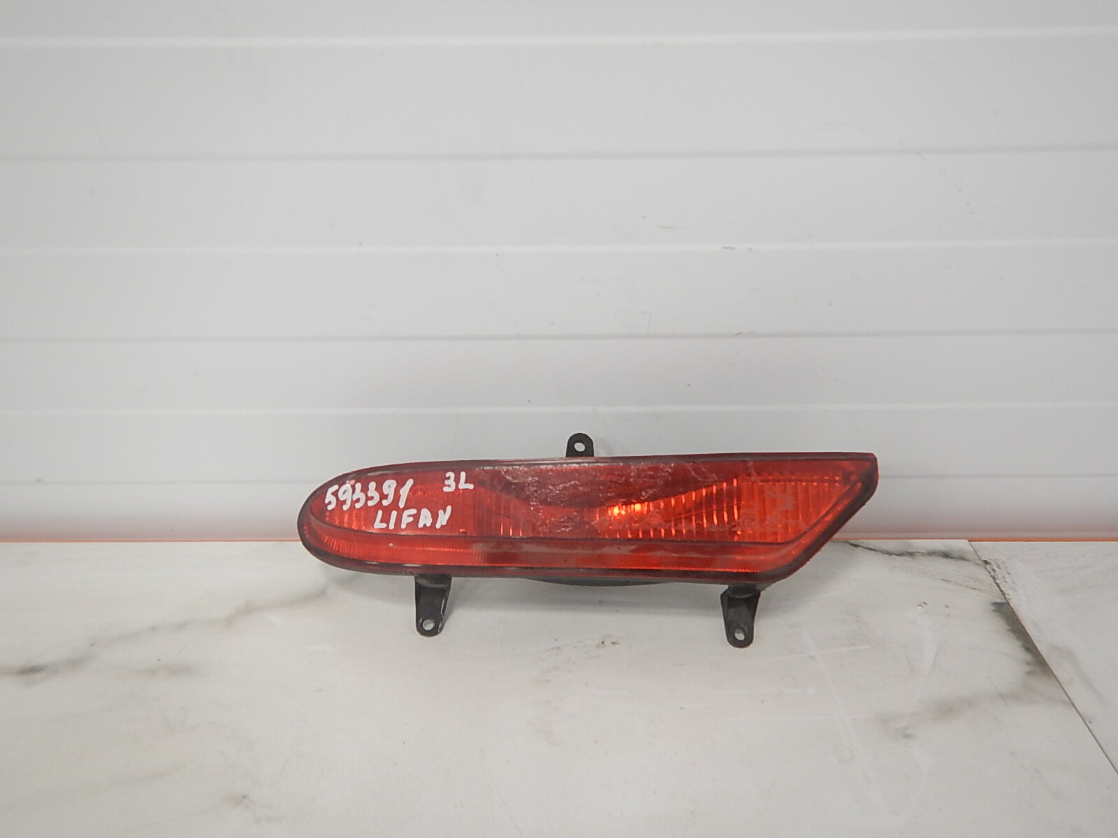 Б/У Фонарь задний противотуманный левый, Lifan (Лифан)-BREEZ (07-14) BREEZ (07-14) Следы клея,царапины. 593391 LIFAN арт...