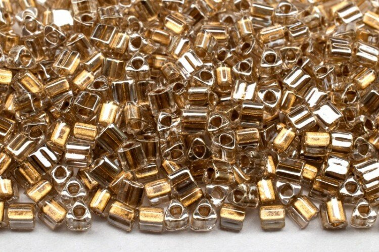 Бисер японский TOHO Triangle треугольный 11/0 #0989 хрусталь, золотая линия внутри, 5 грамм