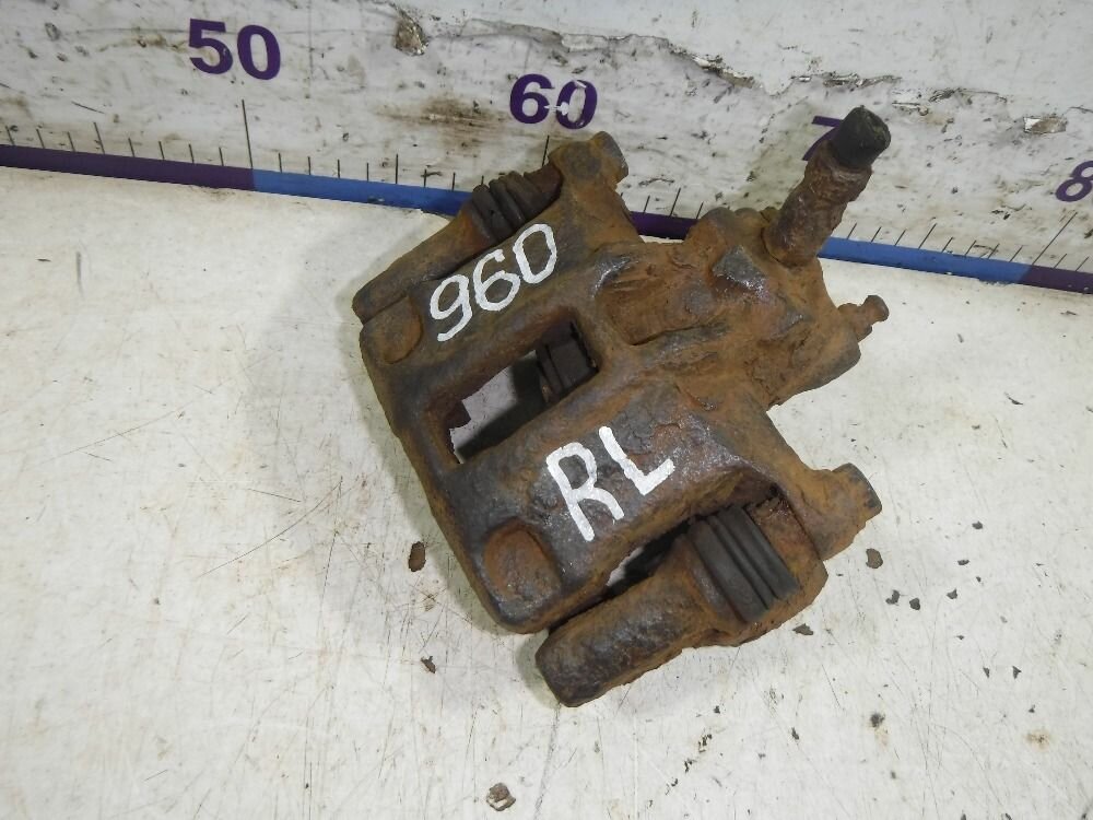 Суппорт задний левый Volvo 960 9140394