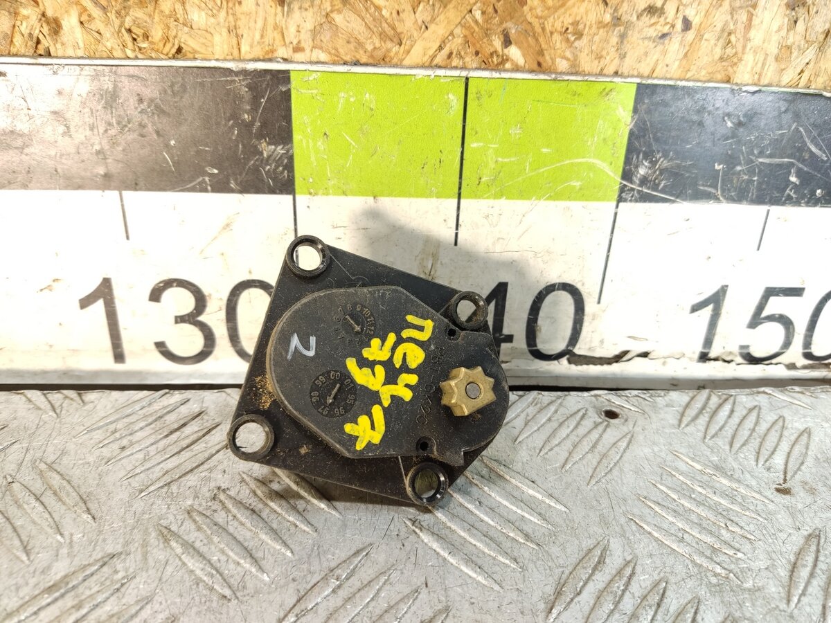 Моторчик заслонки отопителя OPEL Vectra B 657102JA