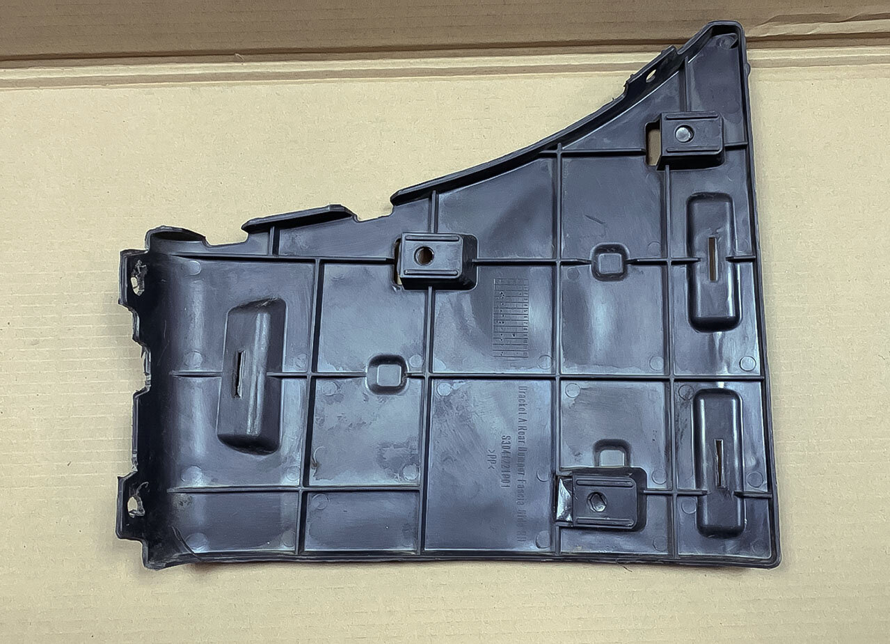 Кронштейн заднего бампера правый Nexia N150 новый (оригинал)