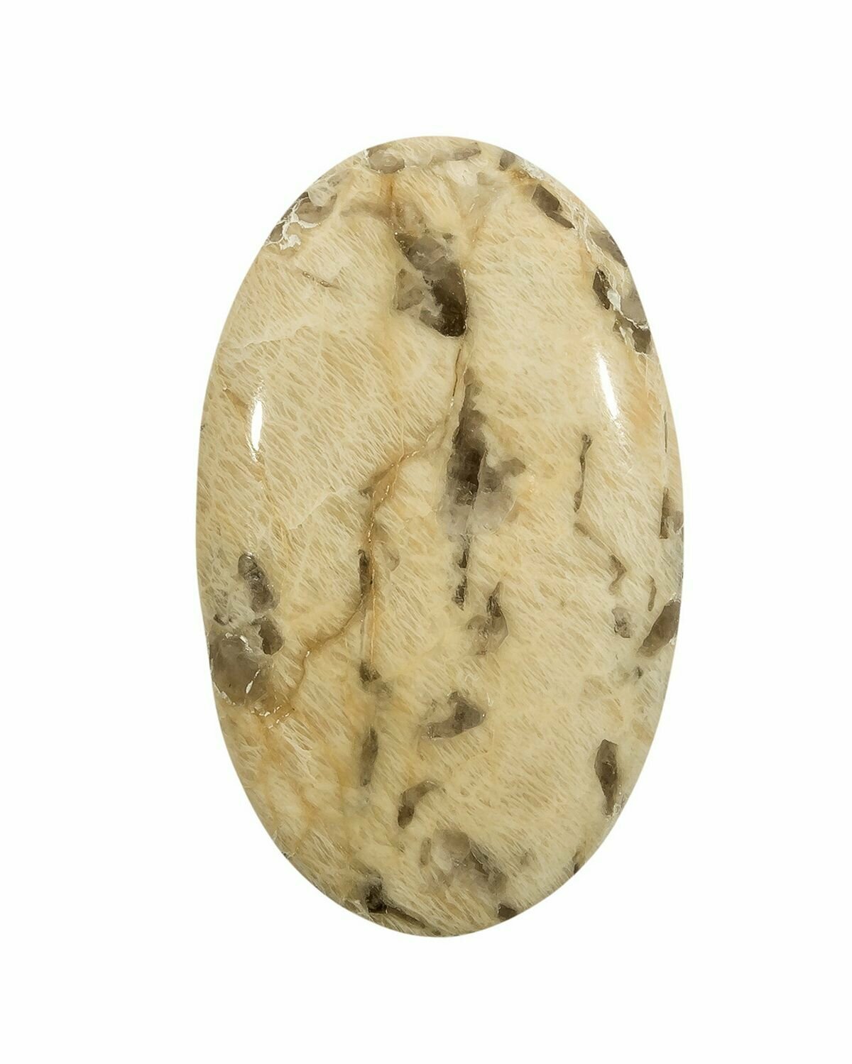 Кабошон из пегматита размером 45х28х6 мм.