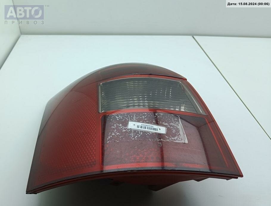 Фонарь задний левый Audi A4 B6 (2001-2004)