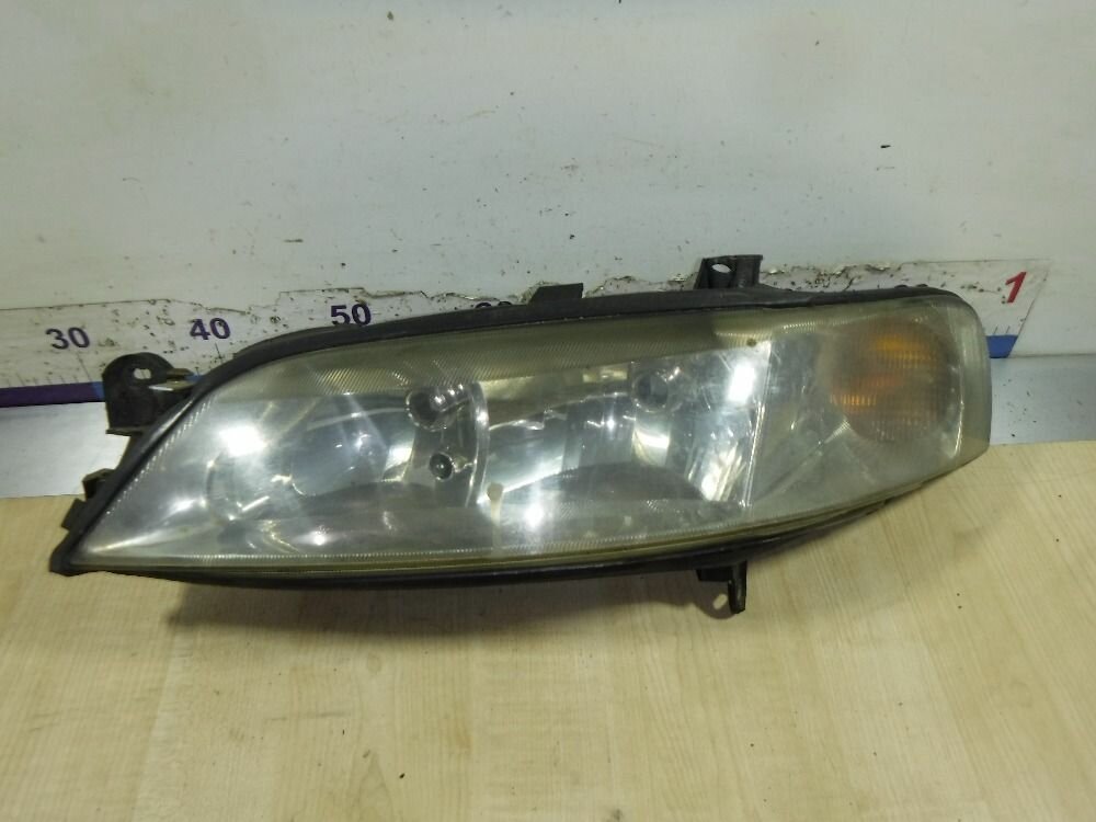 Фара левая Opel Vectra B 90586844