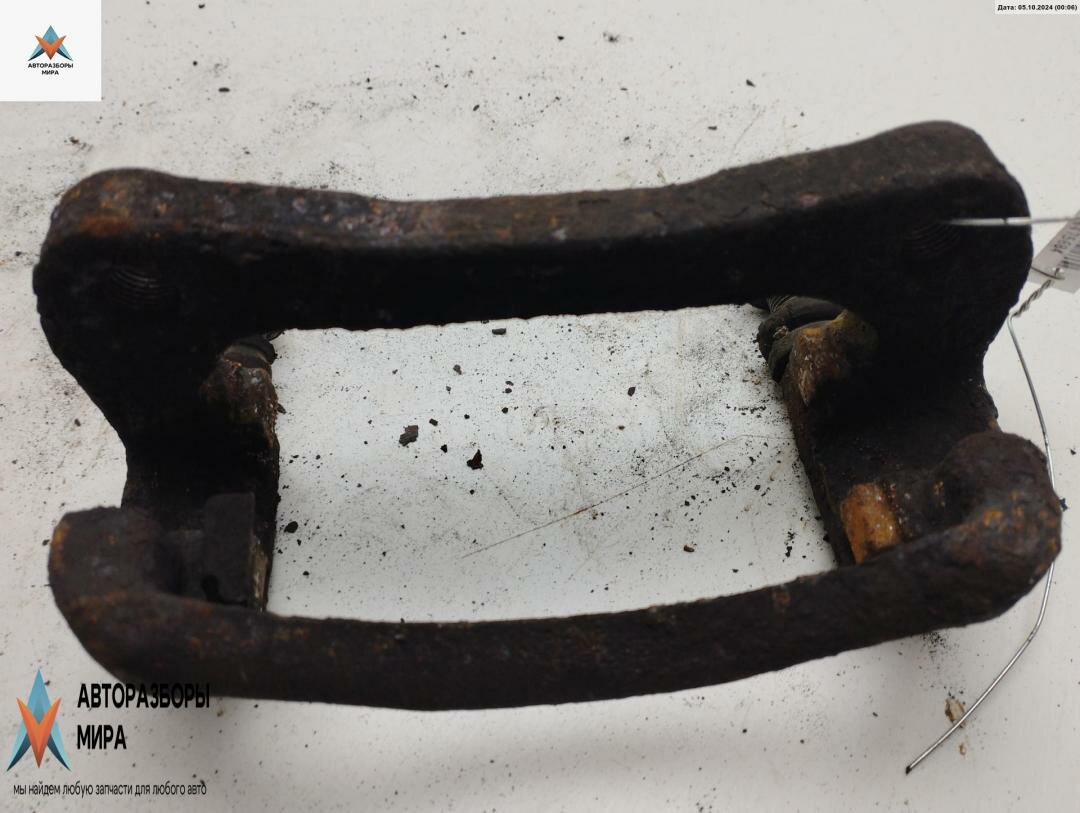 Скоба суппорта Mitsubishi Colt 5 (CJO) 1999