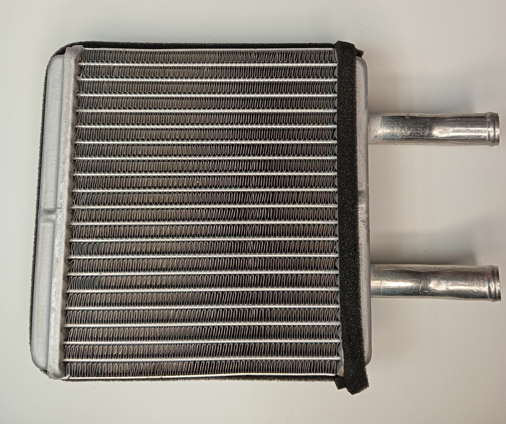 Радиатор отопителя Lifan Smily (320) [1.3 16V 5MT хетчбэк] F8101110