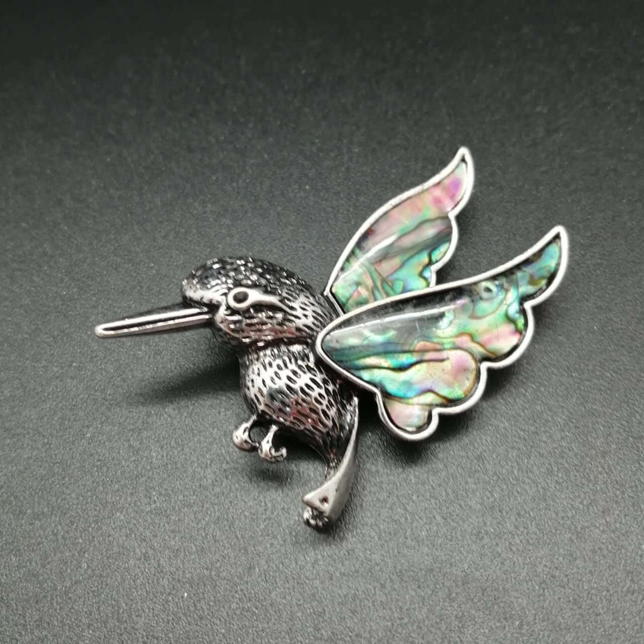 Брошь, гелиотис