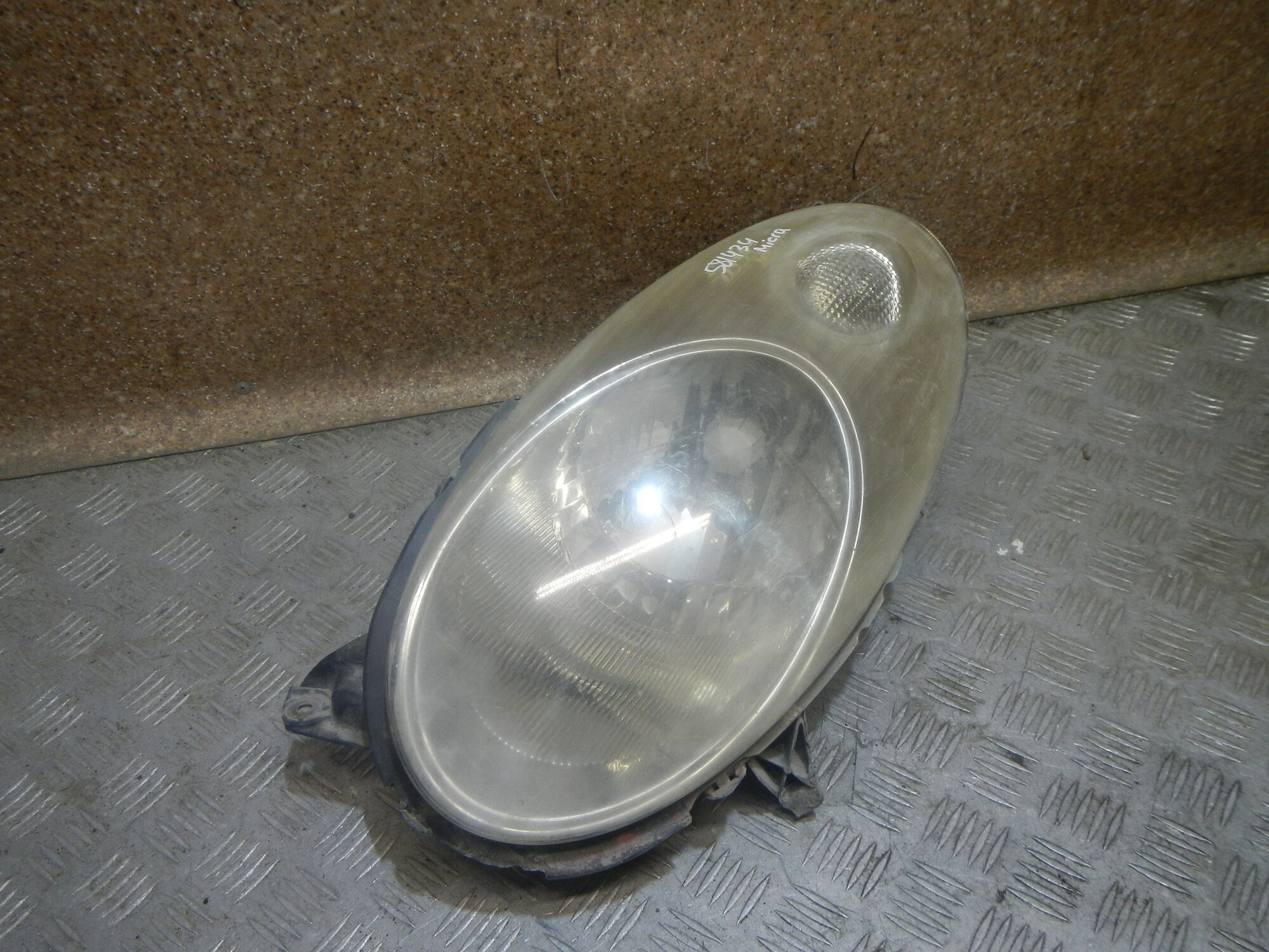 Б/У Фара левая, Nissan (Ниссан)-MICRA (K12E) (02-) NISSAN MICRA (K12E) (02-) Царапины, сломано 2 крепления, следы ремонт...