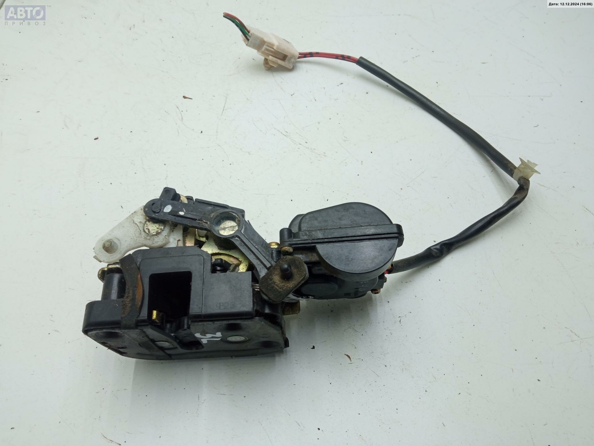 Замок двери задней левой Mazda 323 (1998-2003) BJ