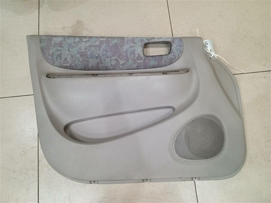 Обшивка двери передней левой от Toyota Corolla Spacio E110 1997-2001