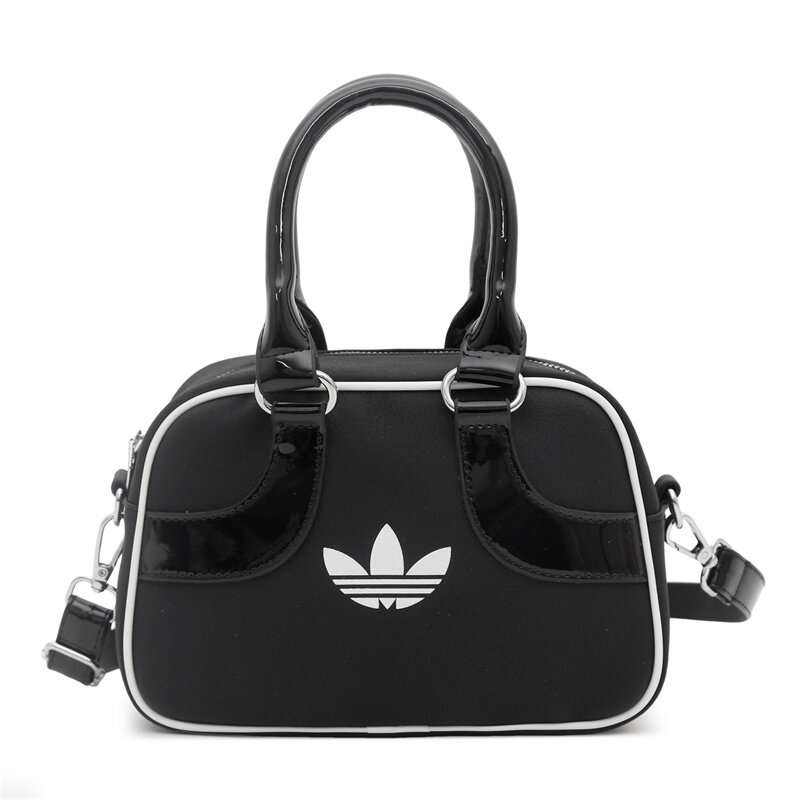 Женская сумка Adidas, доступна в нескольких цветах, изготовлена из полиуретана, вместительная.