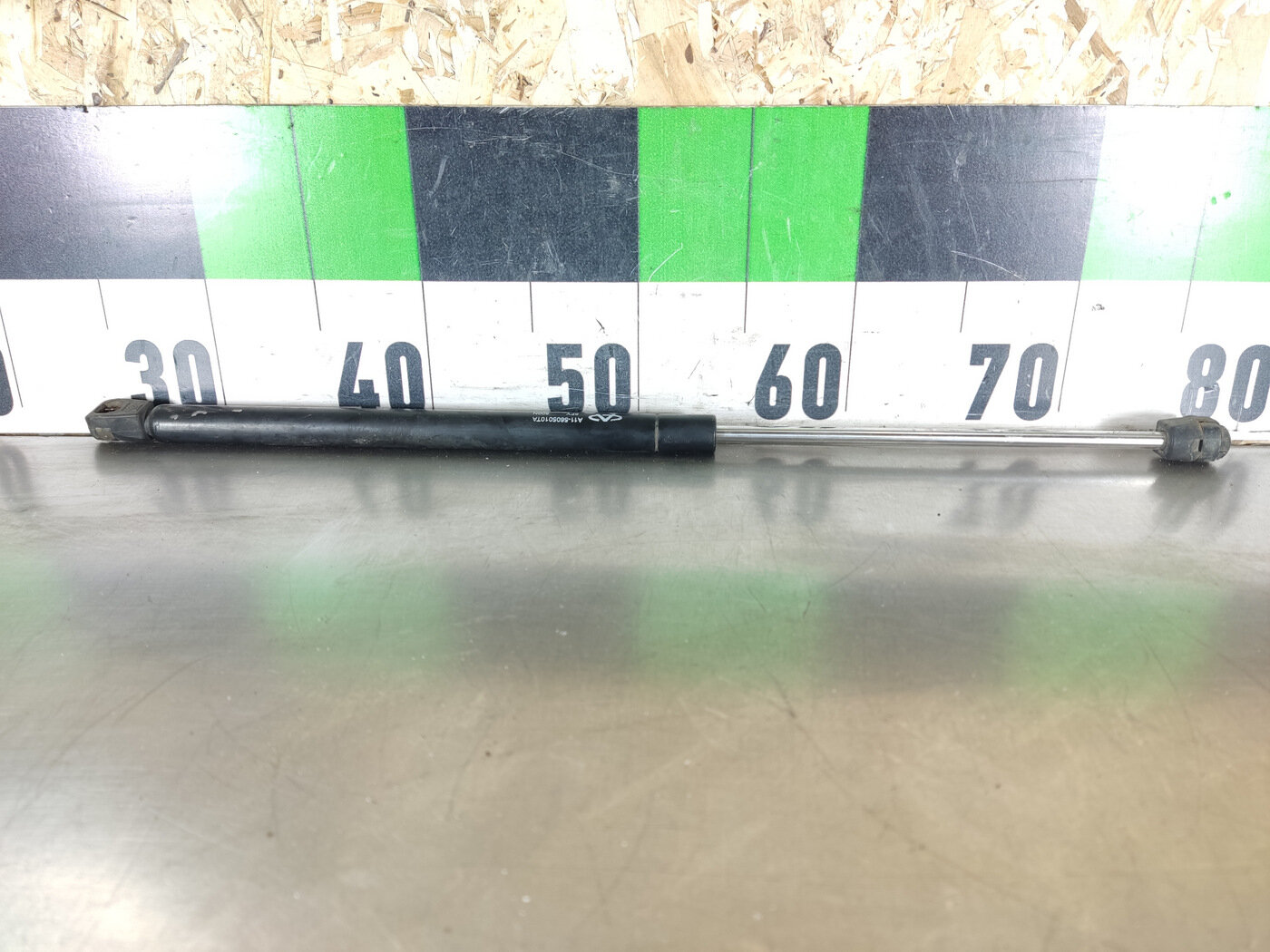 Амортизатор двери багажника CHERY Amulet 2006-2012 A115605010TA