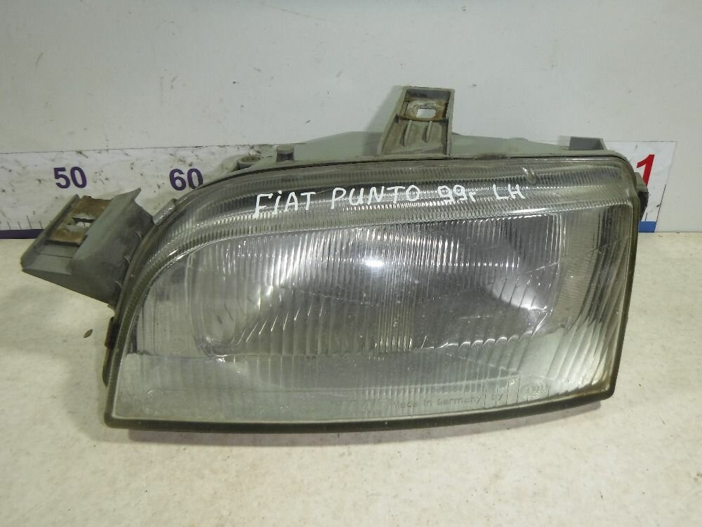 Фара левая Fiat Punto I 46407146