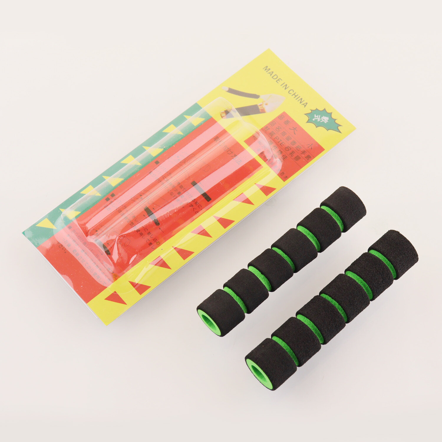 Грипсы (накладки на рычаги руля) (зеленые, поролон) "KOMATCU"