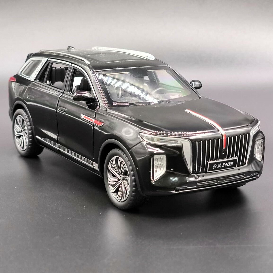 Металлическая модель Hongqi EHS9 (Хончи И-ЭйчЭс9) с инерционным механизмом и свето-звуковым сопровождением. Масштаб 1:24