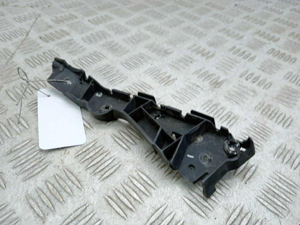 Кронштейн (крепление) переднего бампера правый Opel Astra H арт. 2172367