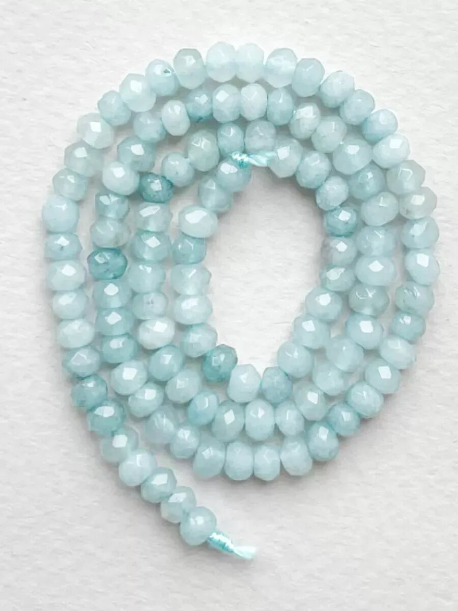 0980 Натуральный агат огранка рондель голубой 3x4 мм 1 шт.