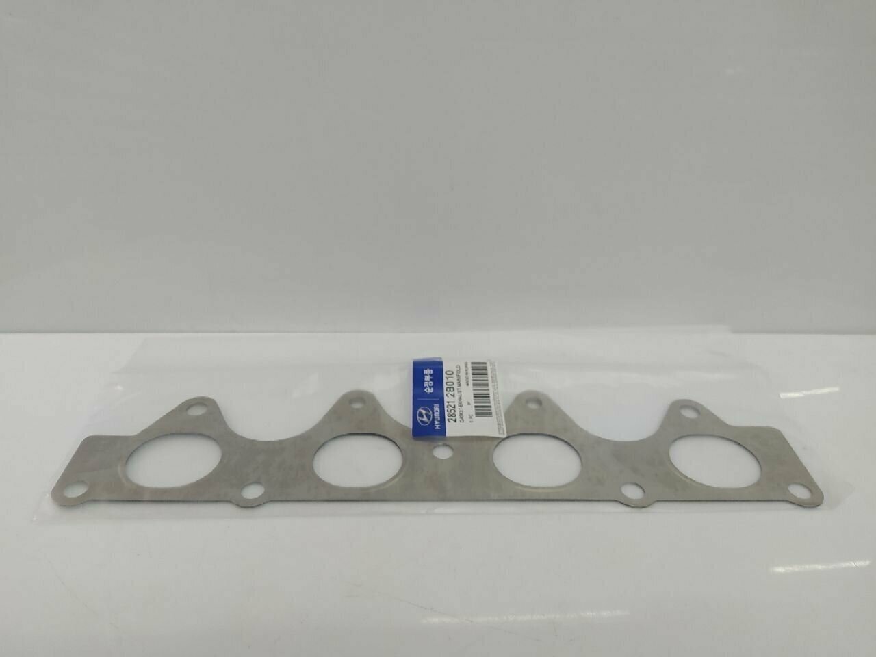 Прокладка выпускного коллектора Hyundai Kia 285212B010 ACCENT SOLARIS CARENS RONDO RIO STONIC