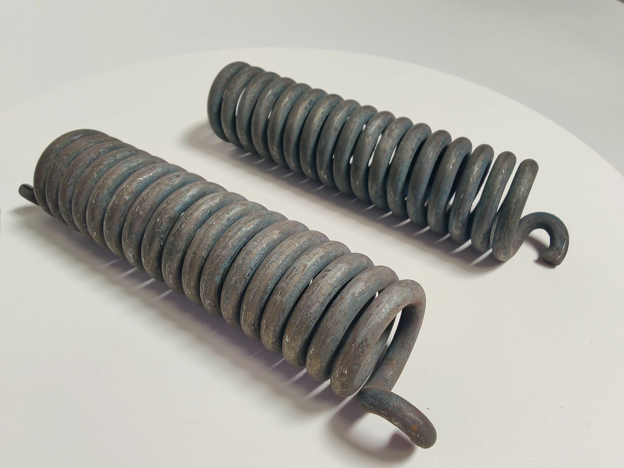 Пружина кпэм Абат (левая, правая - комплект 2шт) код 7223,7224 (кпэм, ЭСК)