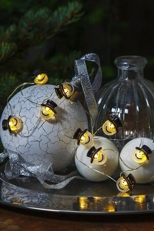 Светодиодная гирлянда снеговички-сноуменчики, на батарейках, 12 тёплых белых LED-огней, 1.1+0.3 м, серебряная проволока, STAR trading 729-39