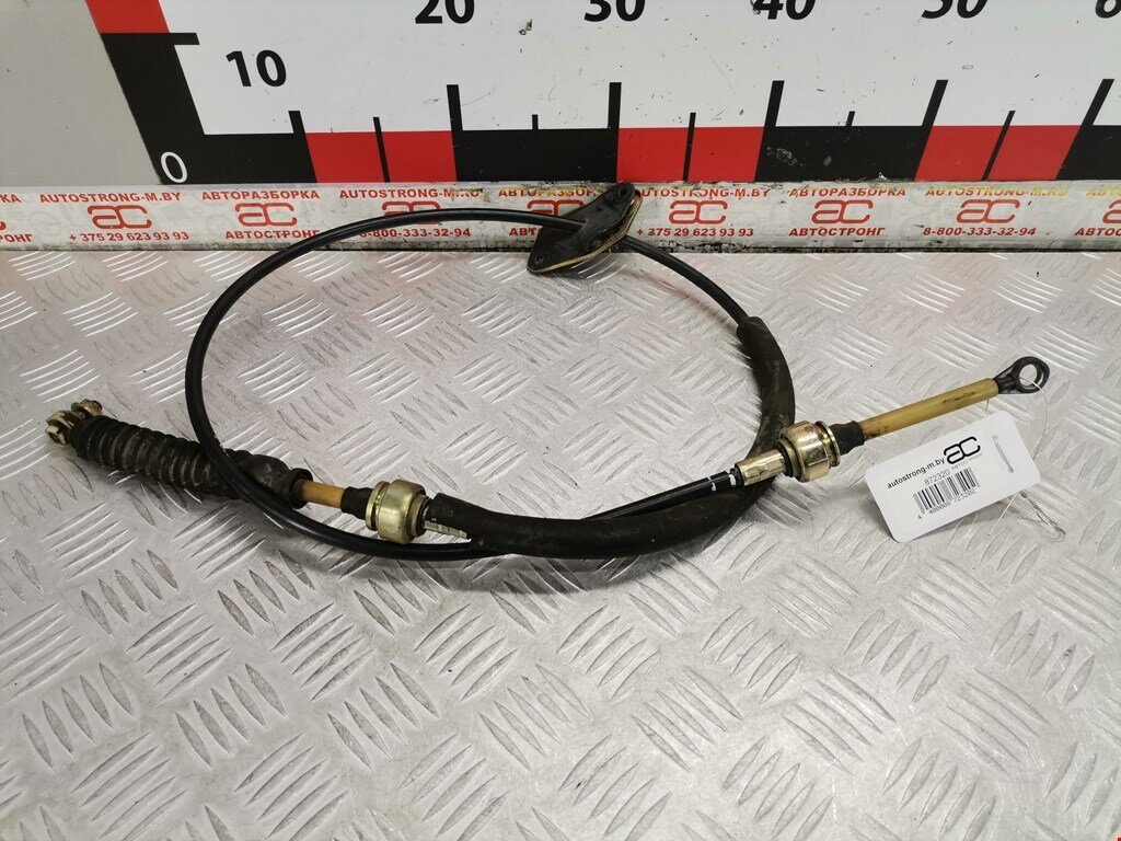 Трос КПП (трос переключения передач трос кулисы кпп) Infiniti QX56 (JA60) 34935ZQ60A арт. 1048321