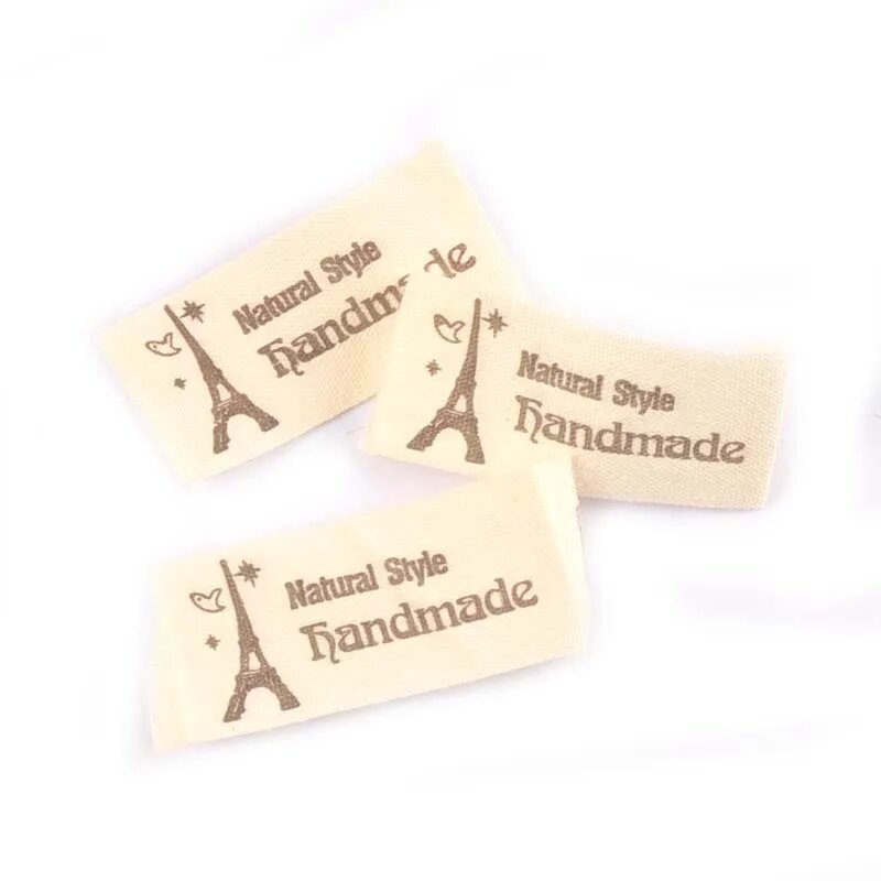 Бежевые тканевые этикетки для одежды 50 шт. античное серебро