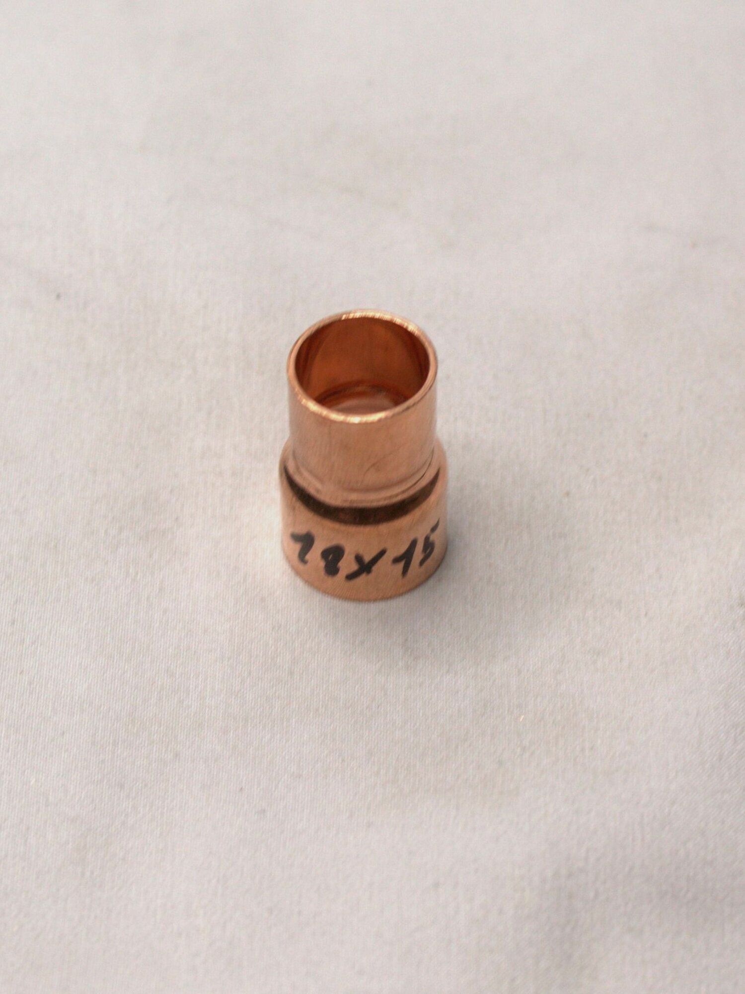 Муфта медная двухраструбная переходная 18х15