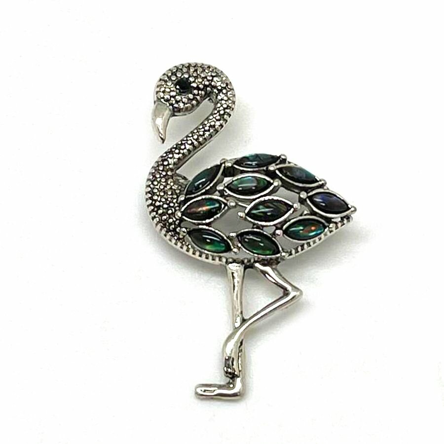 Брошь, гелиотис